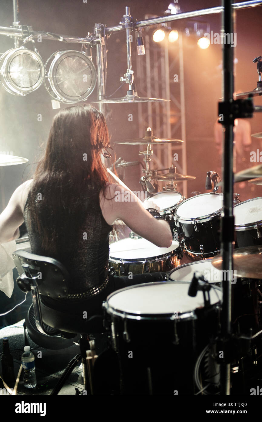 Rear view drummer playing drum hi-res stock photography and images - Alamy