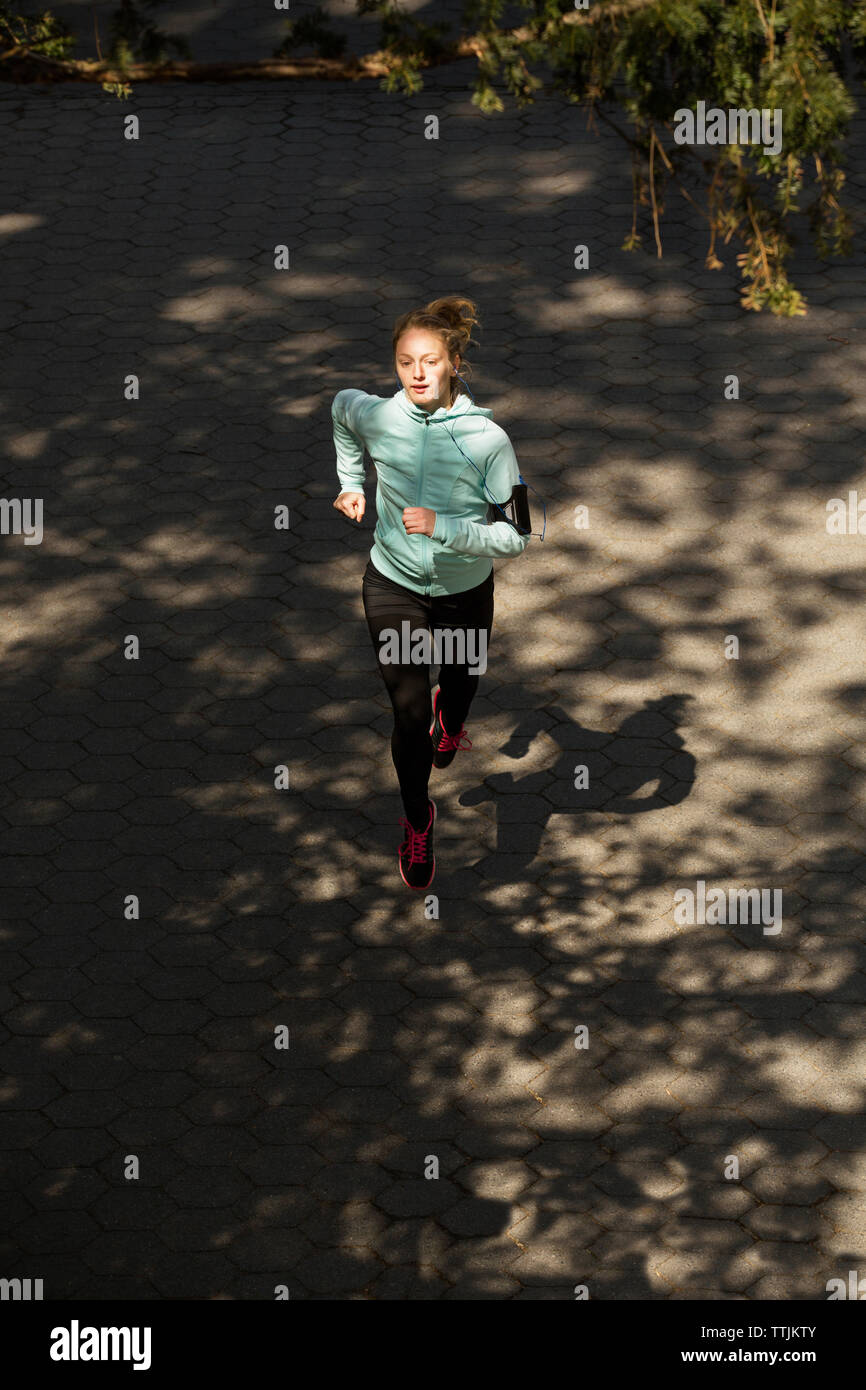 Woman running high angle view hi-res stock photography and images - Alamy