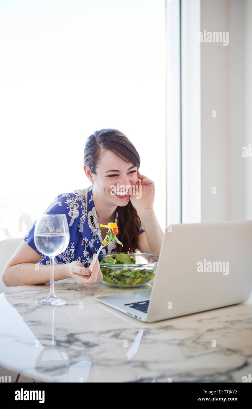 Looking at laptop computer hi-res stock photography and images - Alamy
