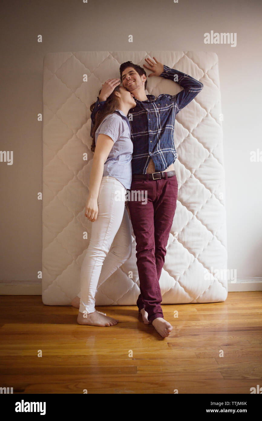 Old man leaning against wall hi-res stock photography and images - Alamy