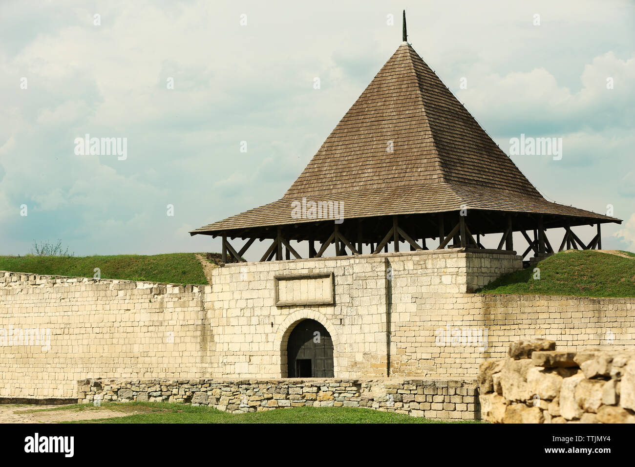 Medieval fortress in village Stock Photo - Alamy