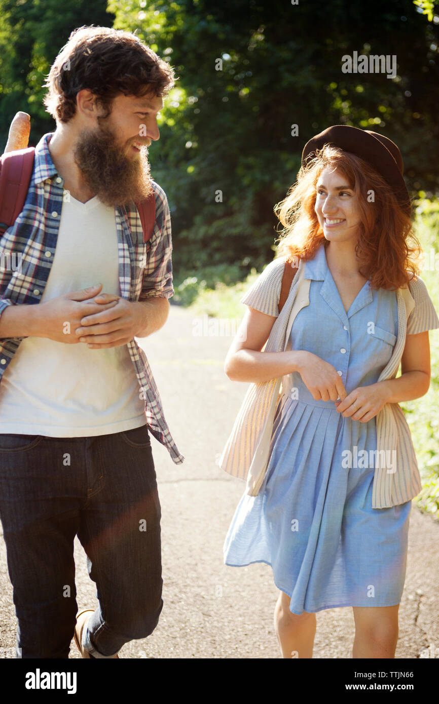 Two friends male female walking hi-res stock photography and images - Alamy