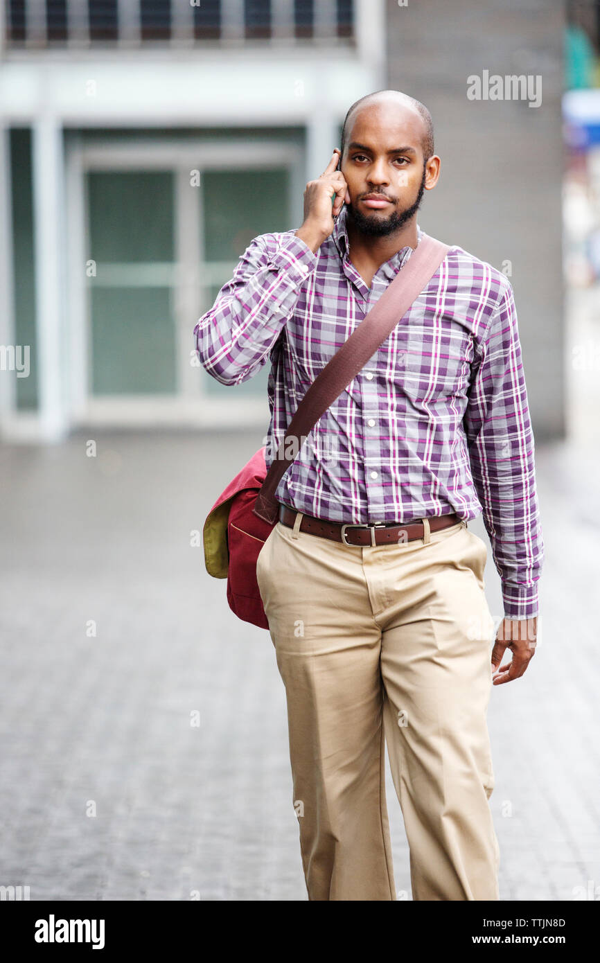 Smart man walking hi-res stock photography and images - Alamy