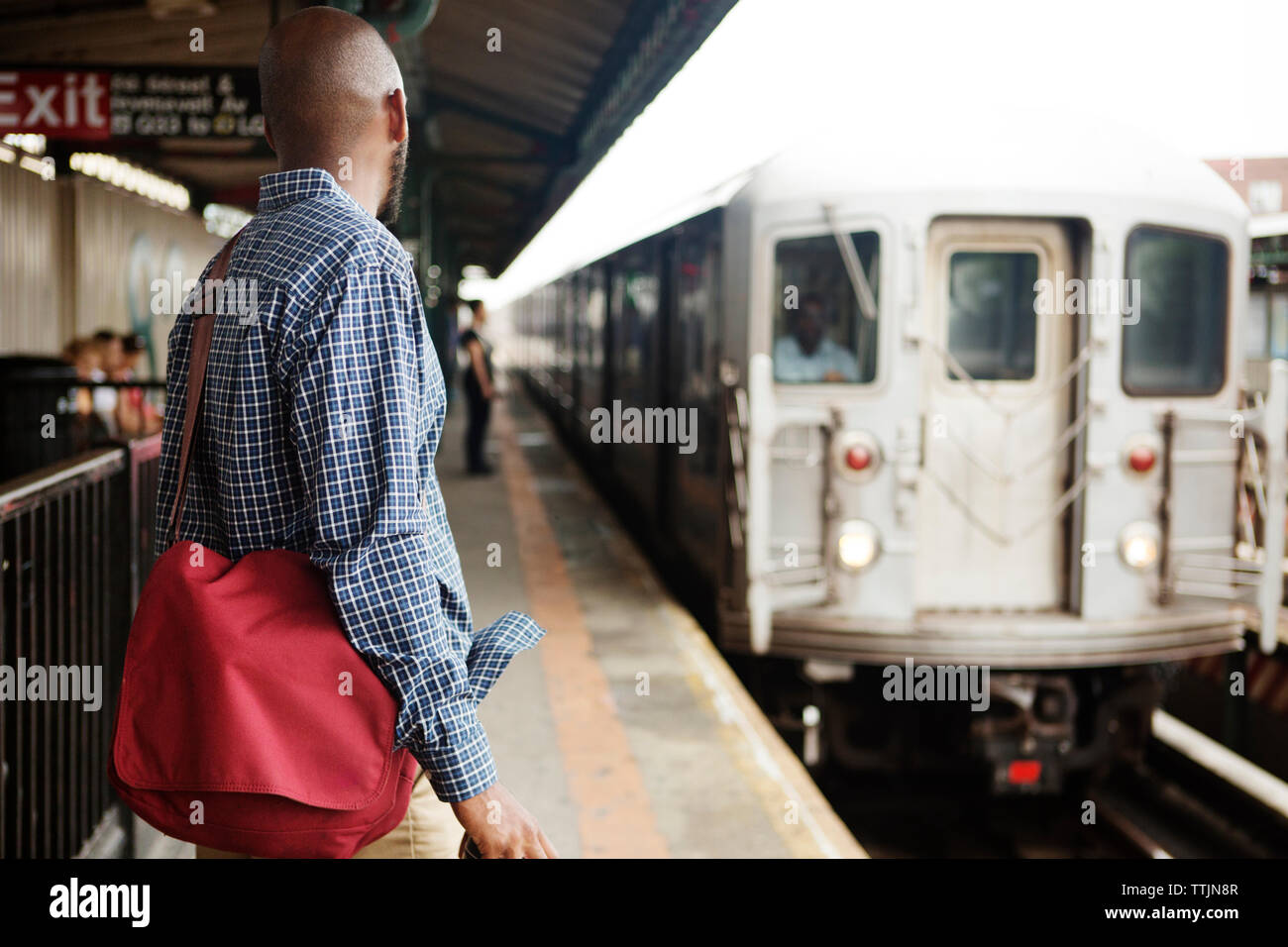 Old man waiting for his train hi-res stock photography and images - Alamy