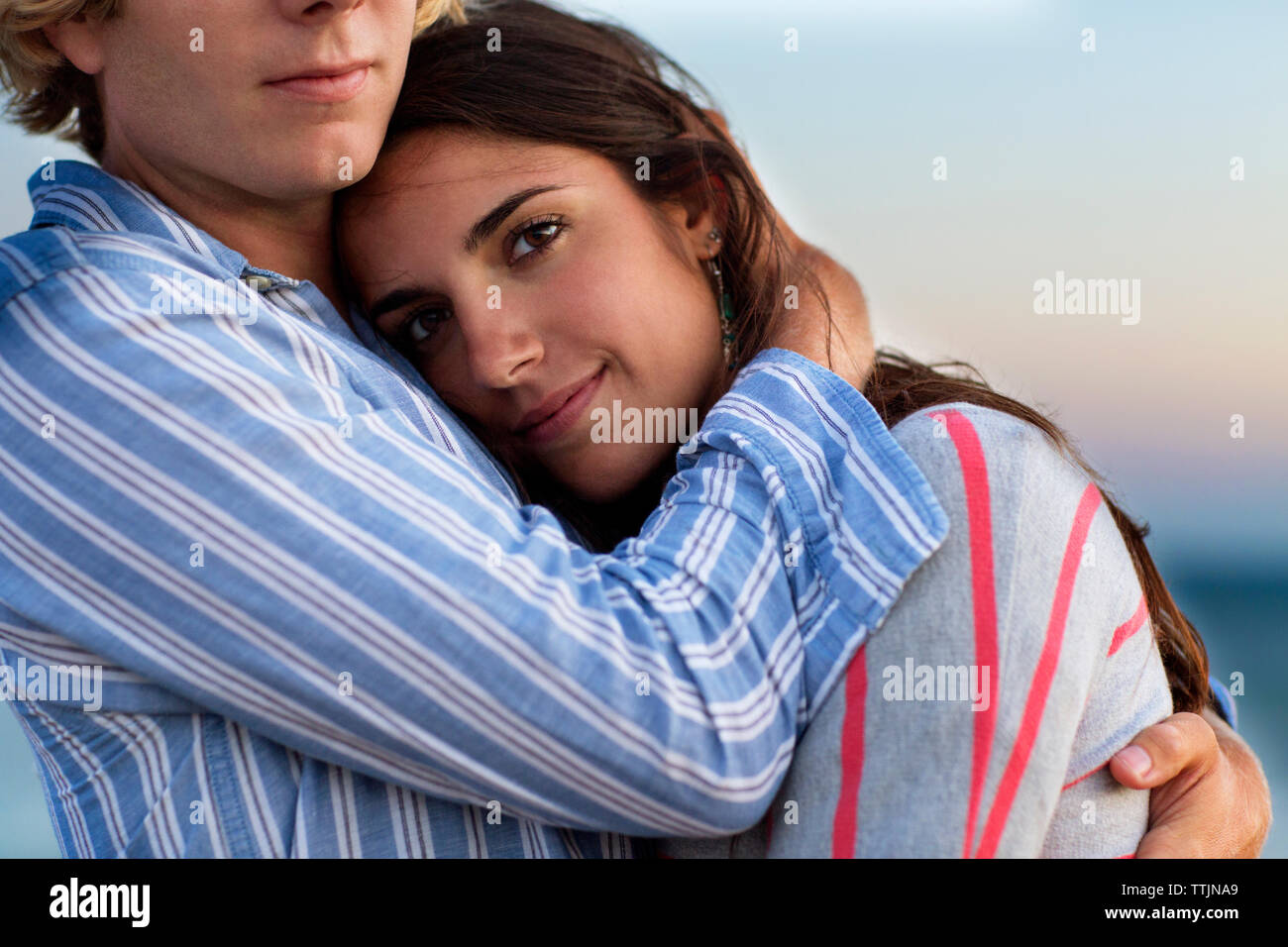Midsection man embracing girlfriend hi-res stock photography and images ...