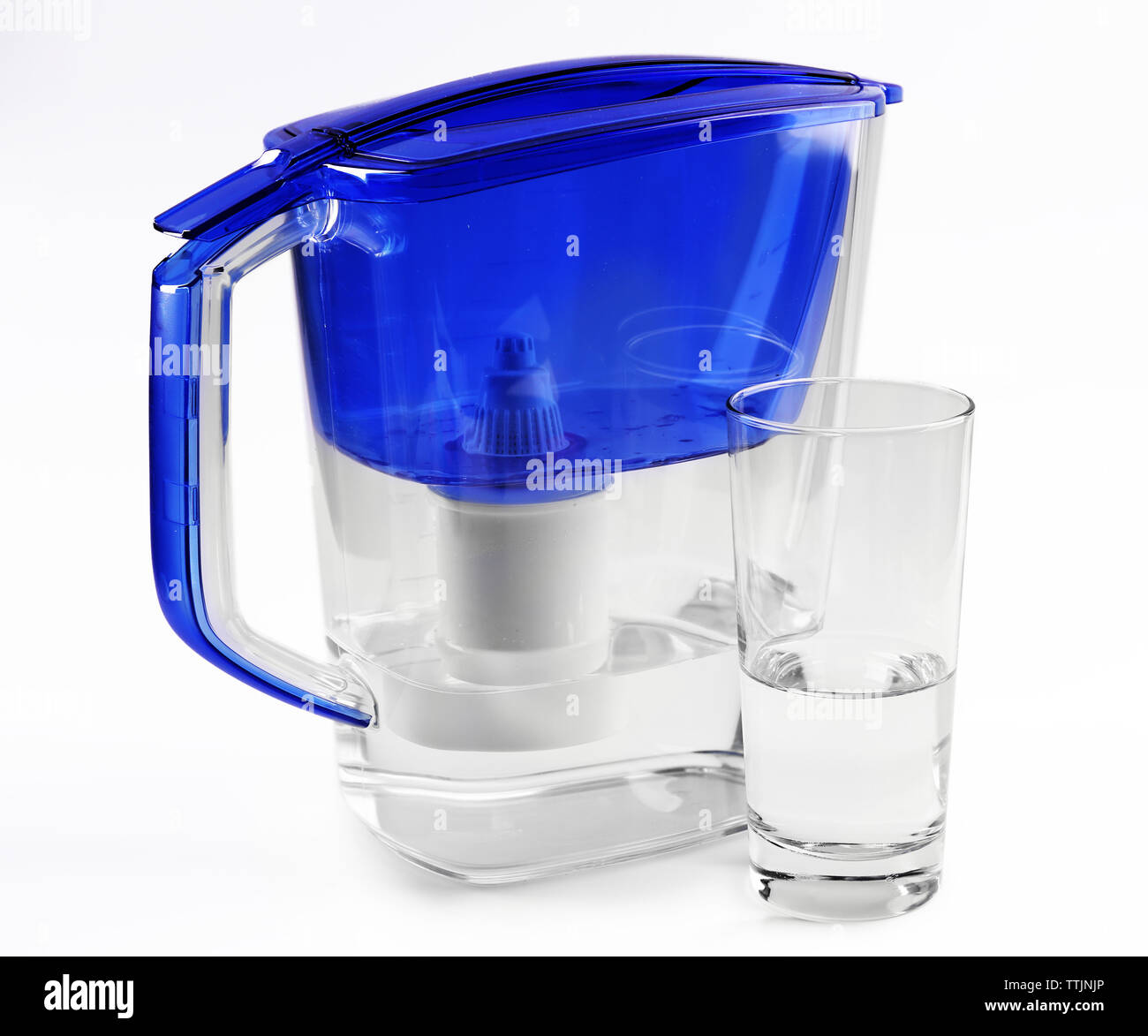 Blue water filter with glass on grey background Stock Photo - Alamy