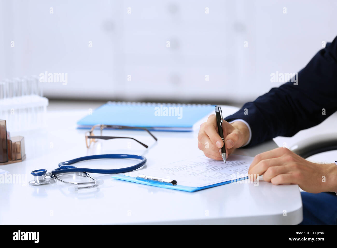 Doctor working at his workplace in hospital Stock Photo - Alamy