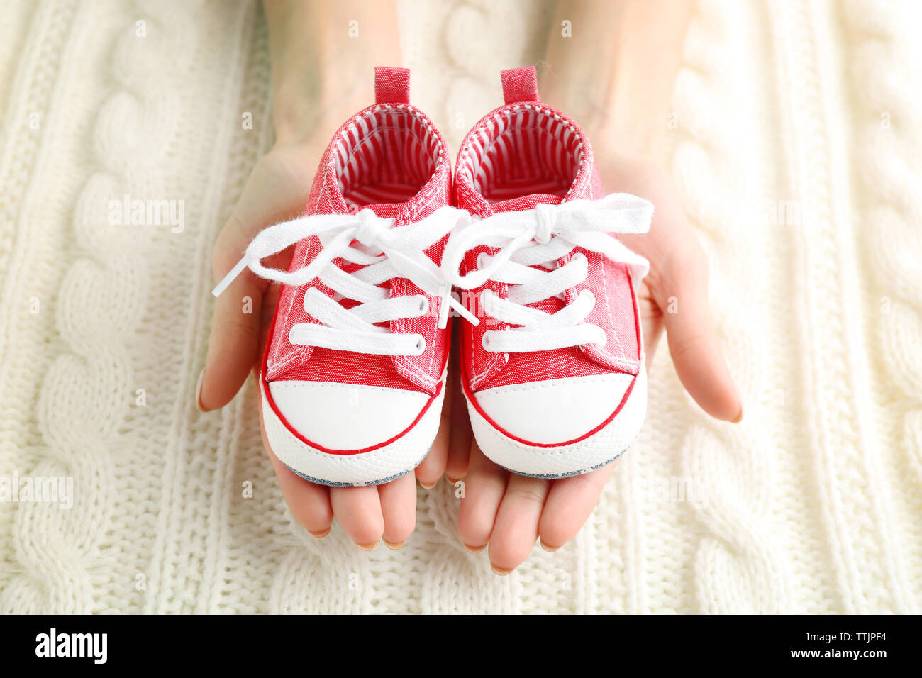 White boots holding hands hi-res stock photography and images - Alamy