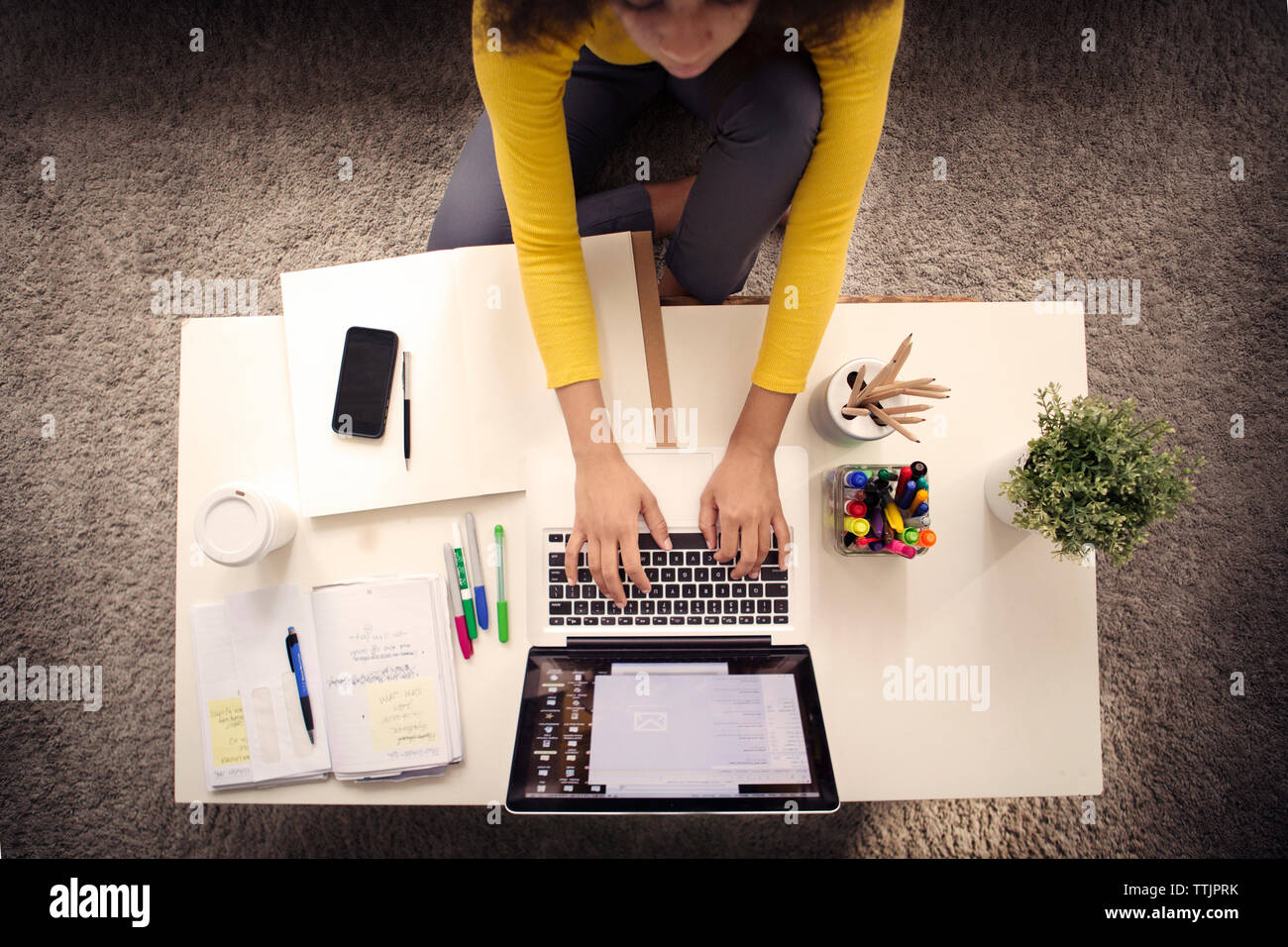 Woman working home computer typing hi-res stock photography and images ...