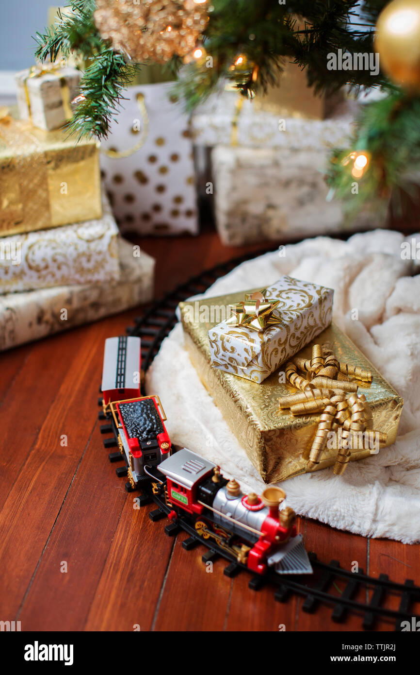 High angle view of miniature train and gift boxes Stock Photo - Alamy