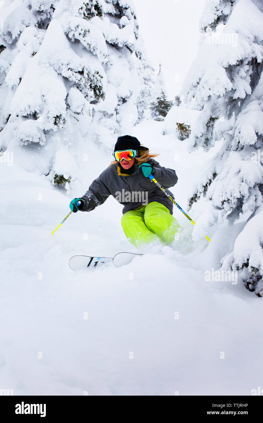 Woman skiing on powder snow hi-res stock photography and images - Alamy