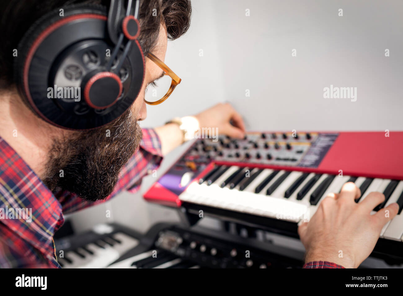Old man playing music instruments hi-res stock photography and images ...