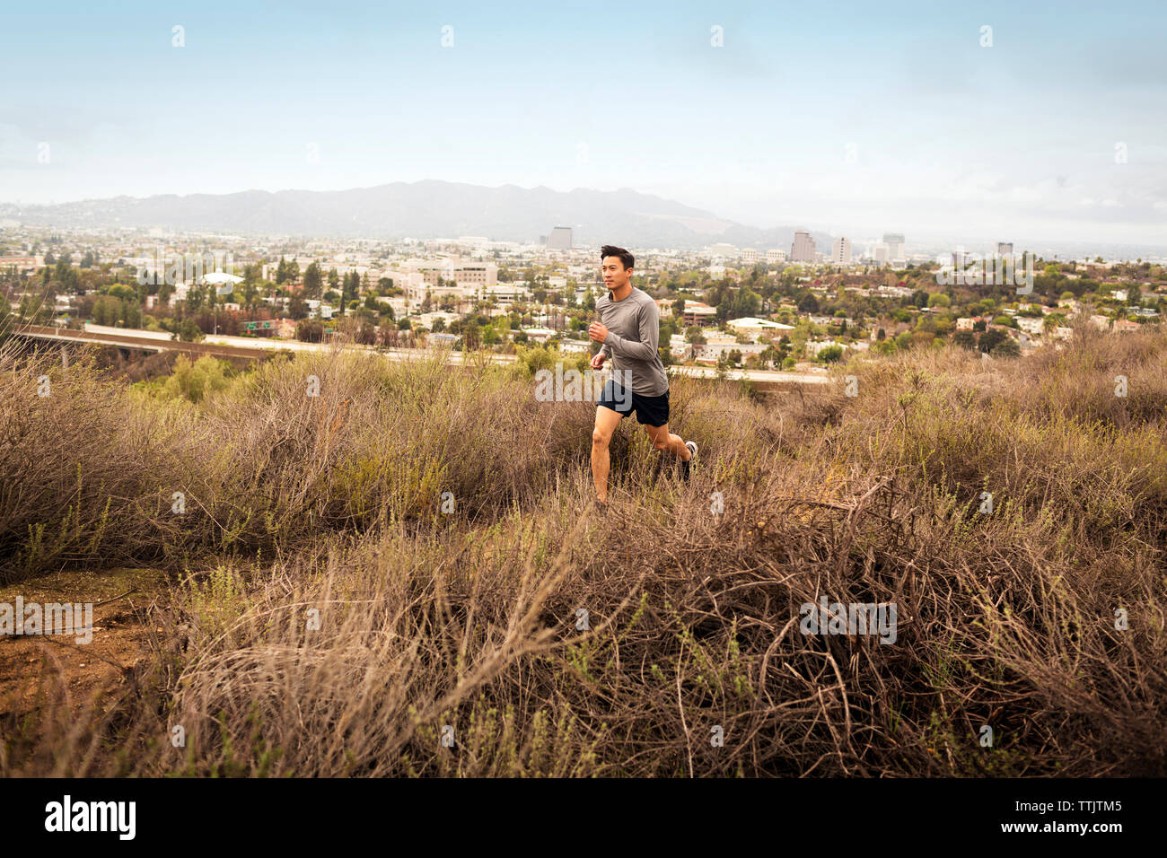 Indian man running hi-res stock photography and images - Alamy