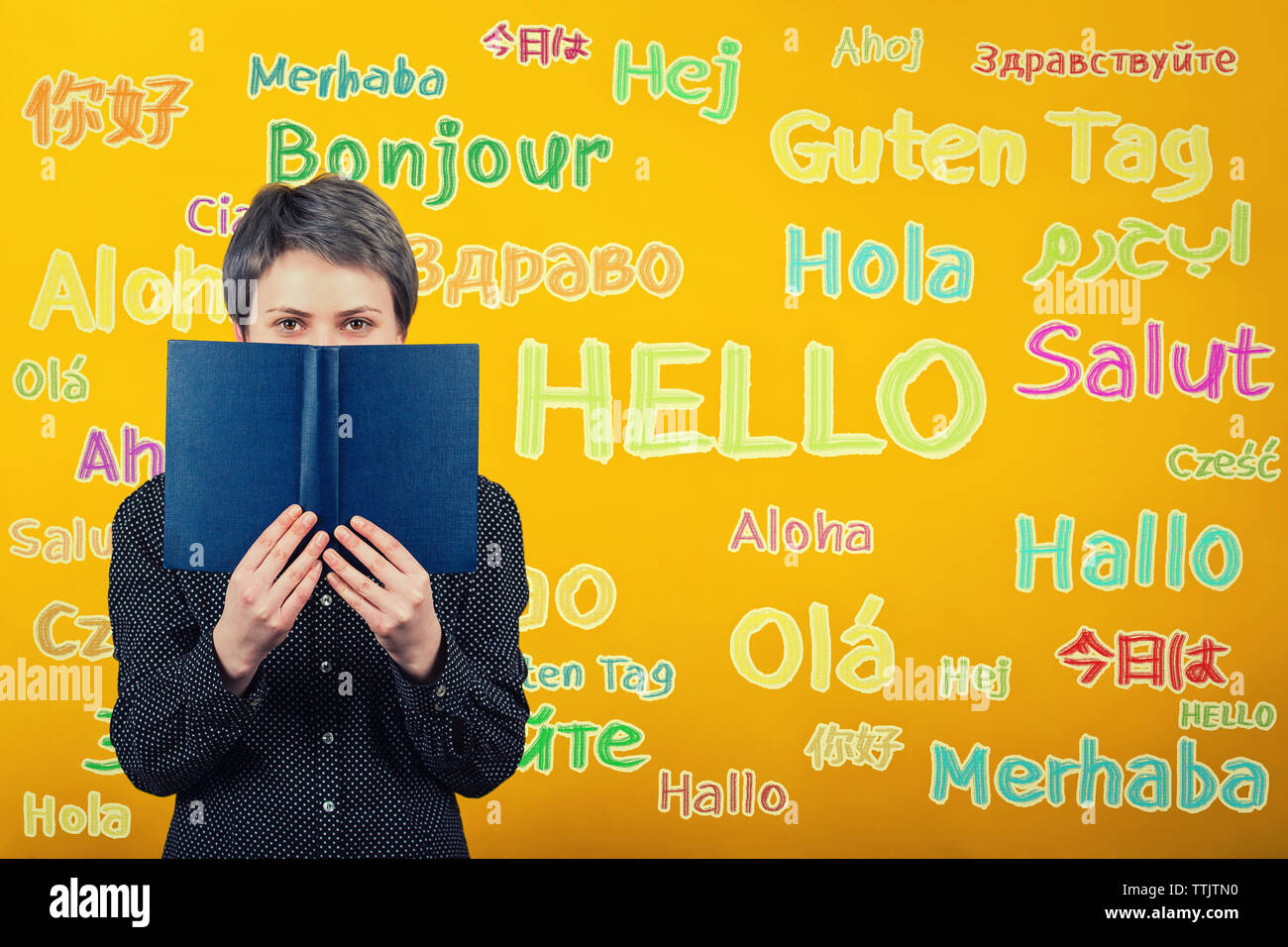 Woman learning language french book hi-res stock photography and images ...