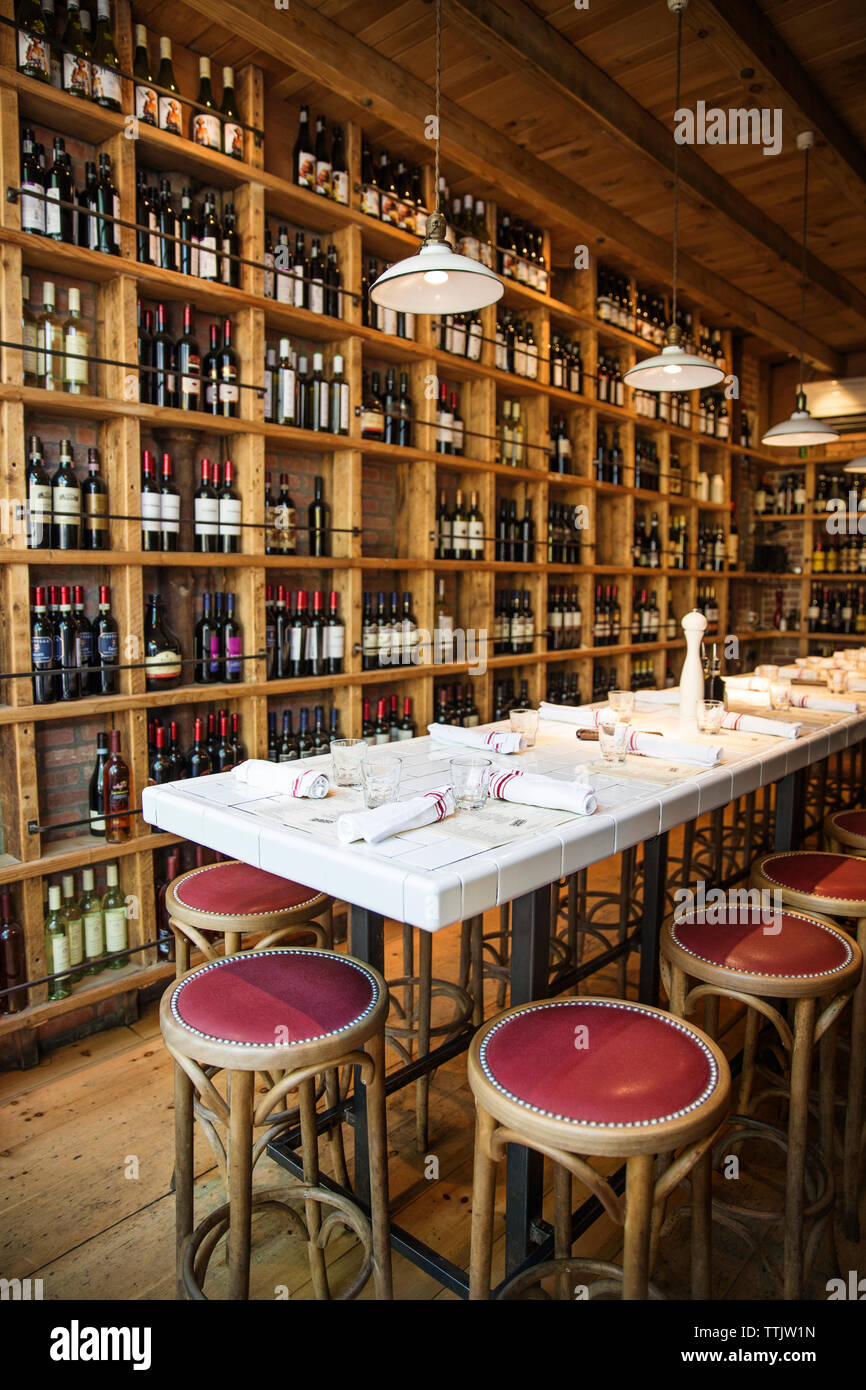 Table in wine store Stock Photo - Alamy
