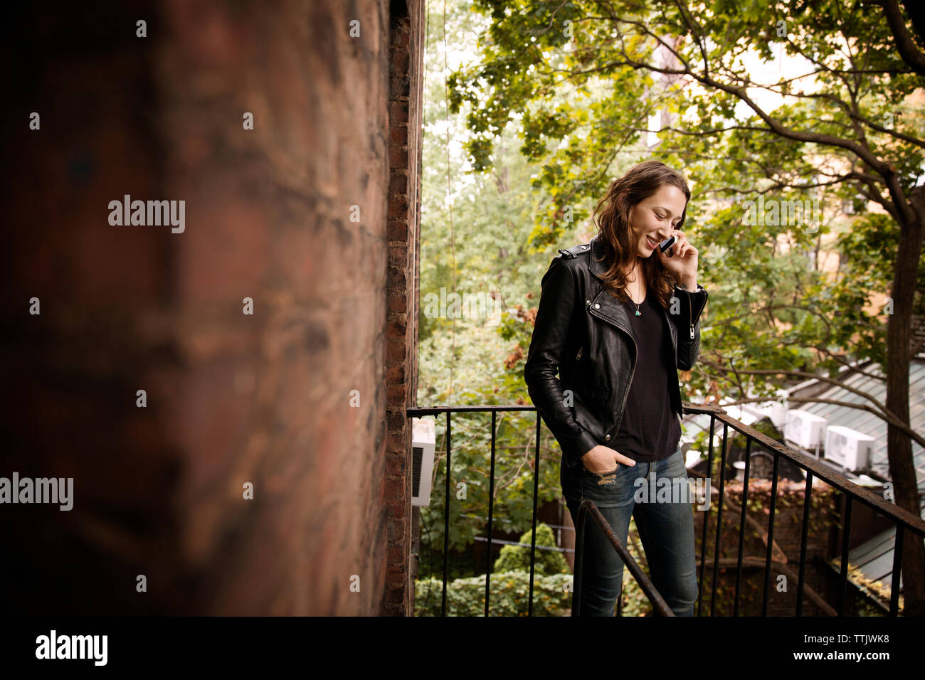 Fire escape woman hi-res stock photography and images - Alamy