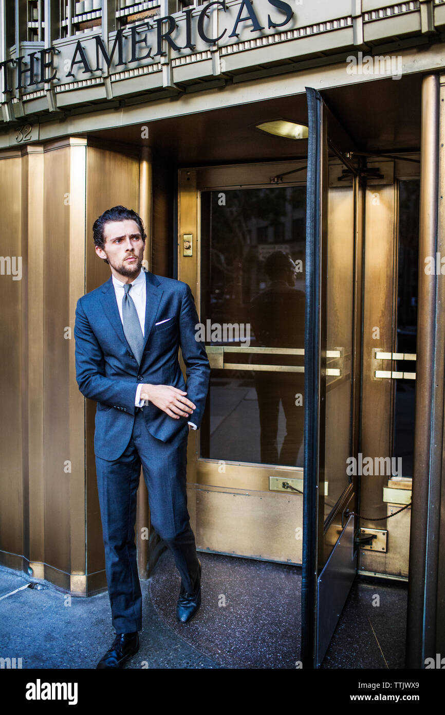 Man walking out door hi-res stock photography and images - Alamy