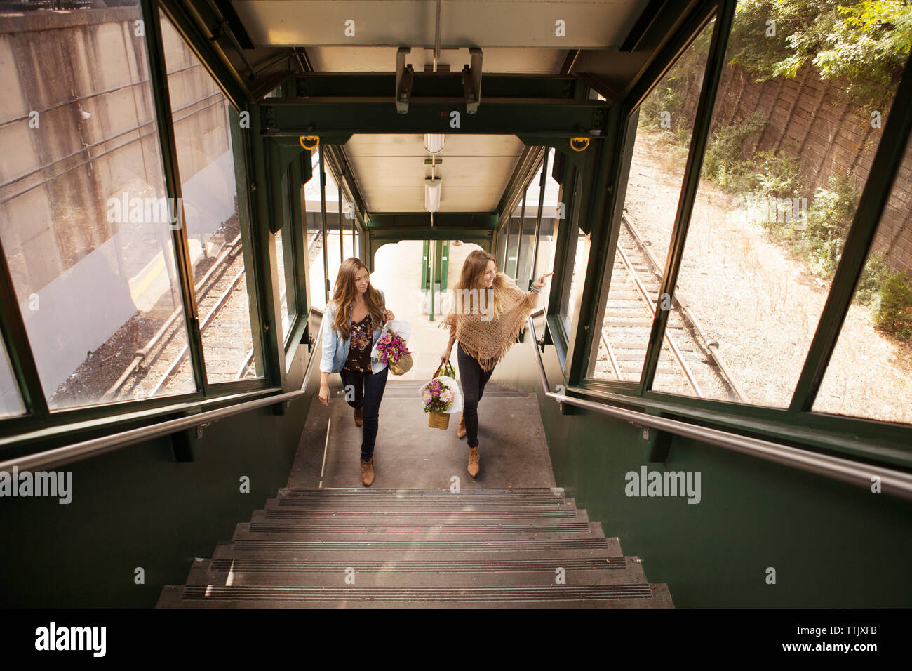 Passengers climbing steps hi-res stock photography and images - Alamy