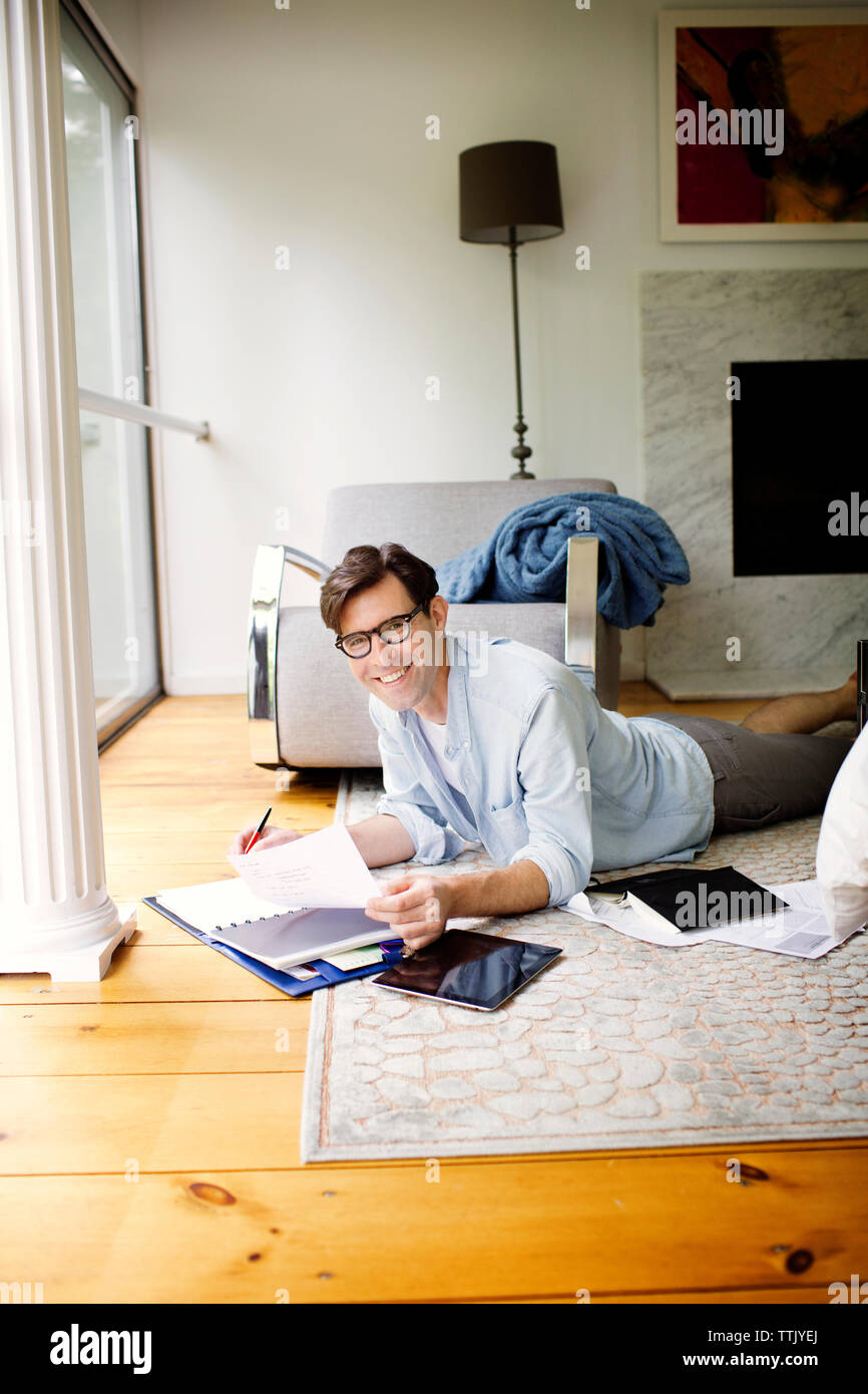 Casual man doing paperwork on hi-res stock photography and images - Alamy