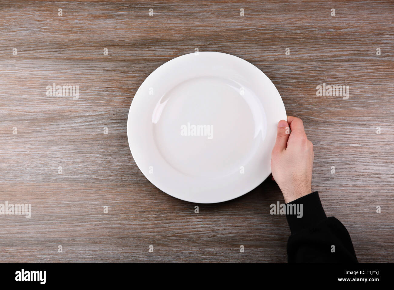 Empty plate hunger hi-res stock photography and images - Alamy