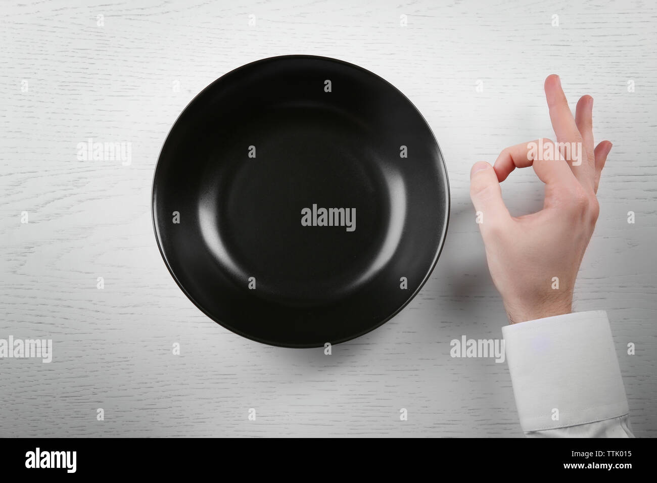 Man making gesture OK. Hunger concept Stock Photo - Alamy