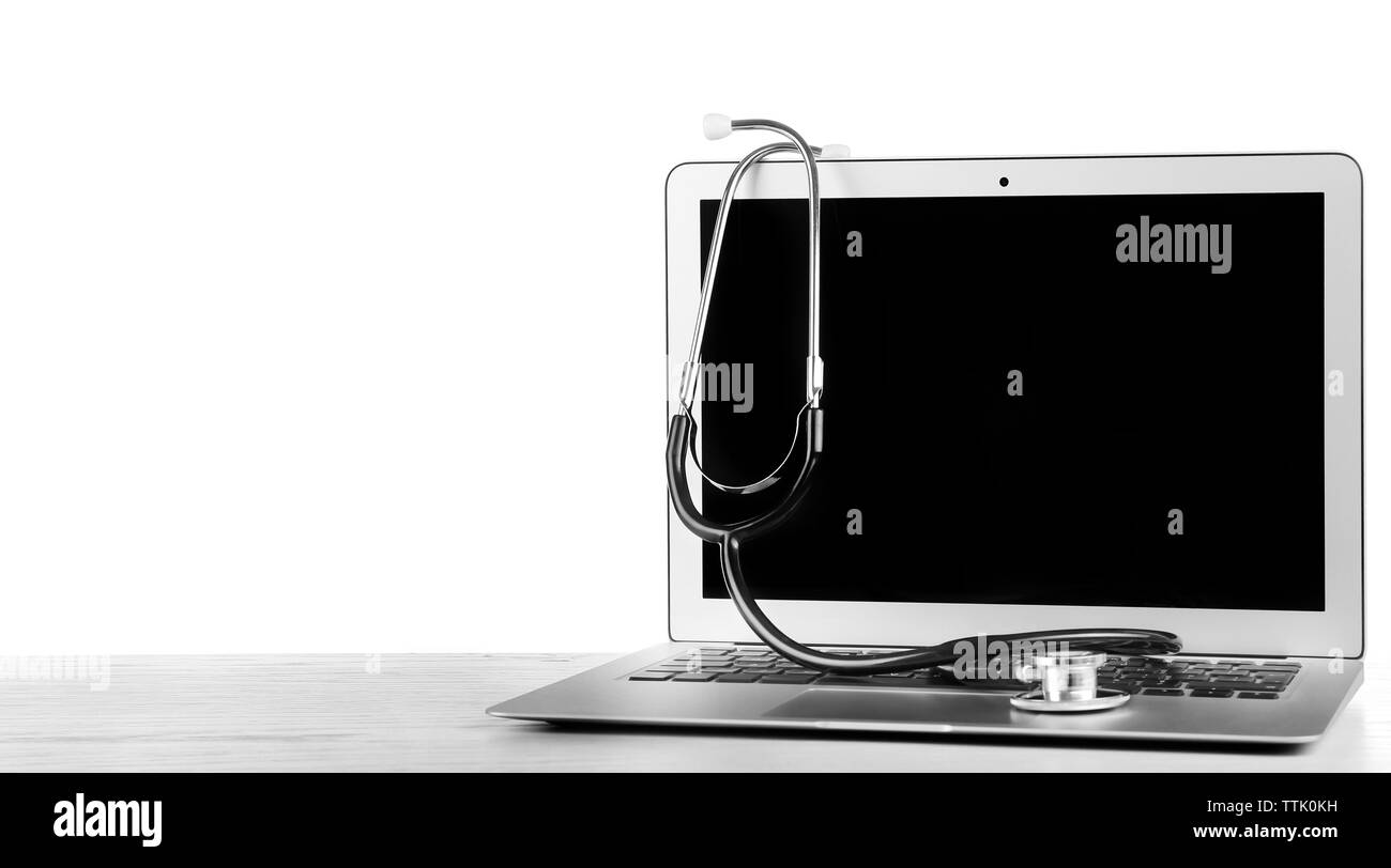 Laptop black stethoscope on Black and White Stock Photos & Images - Alamy