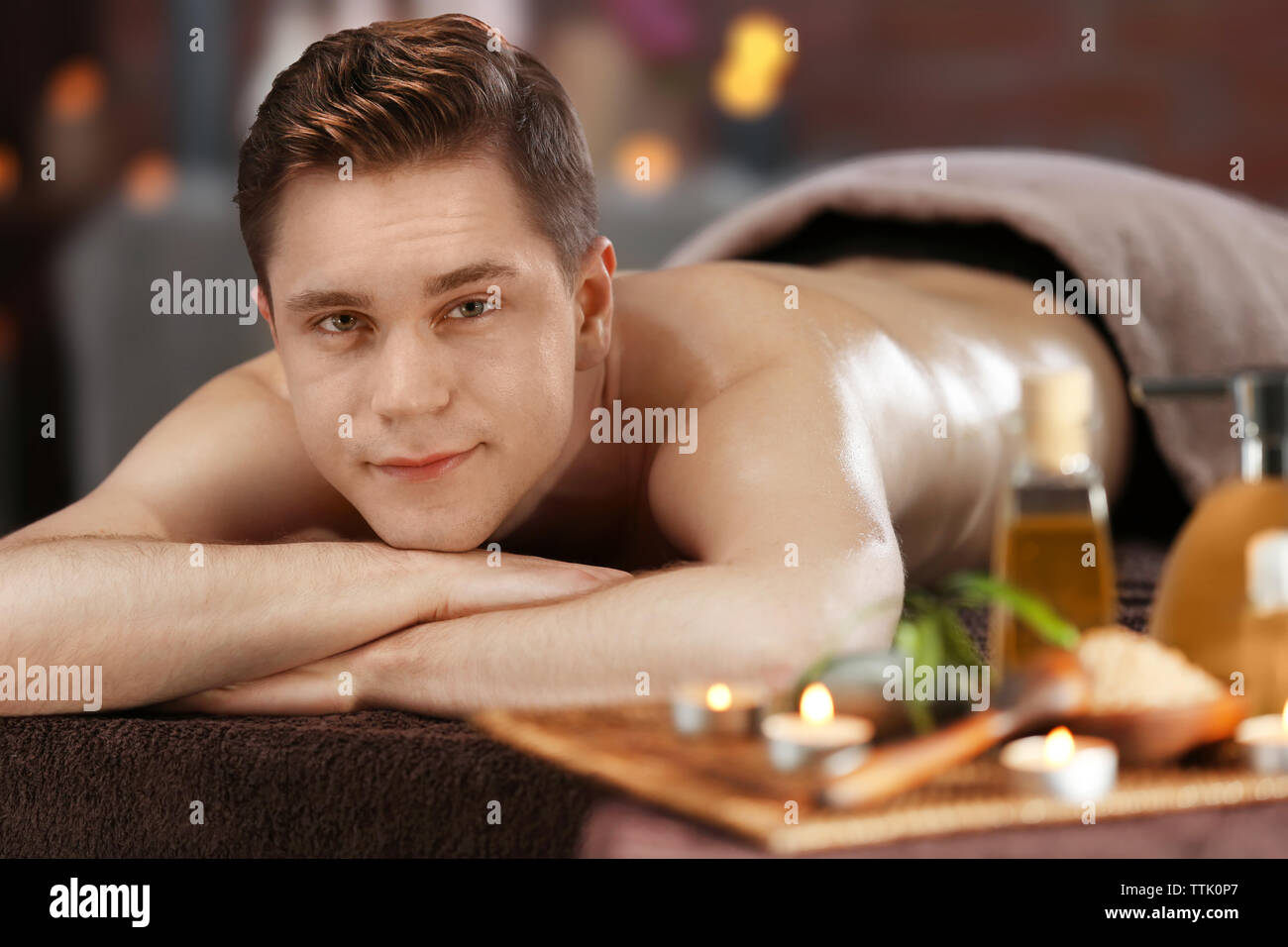 Man relaxing in spa salon Stock Photo - Alamy