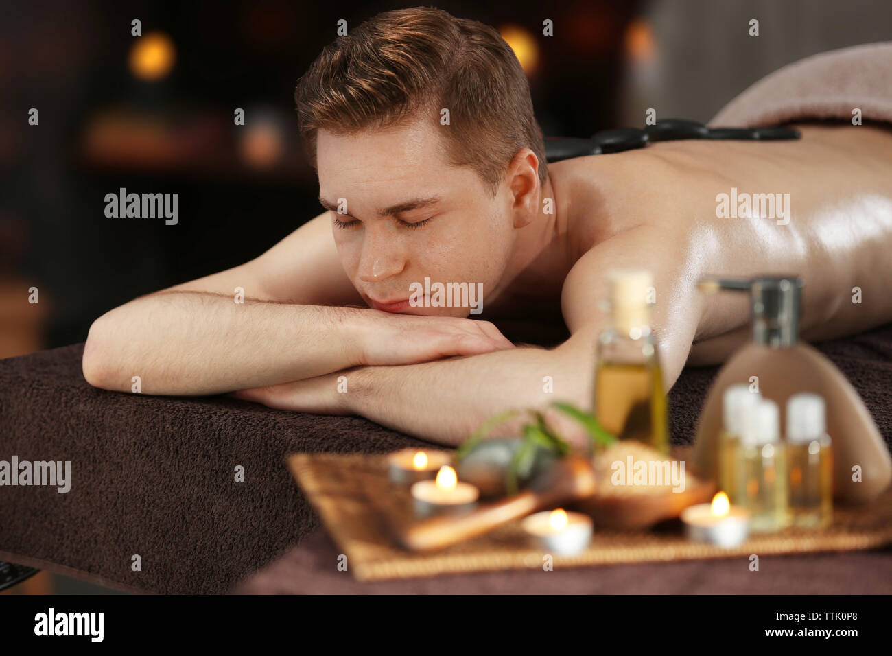 Man relaxing in spa salon Stock Photo - Alamy