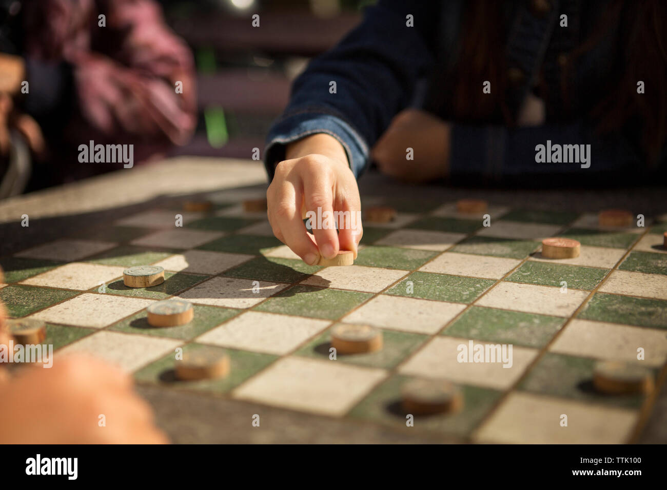 Girls playing board game hi-res stock photography and images - Alamy