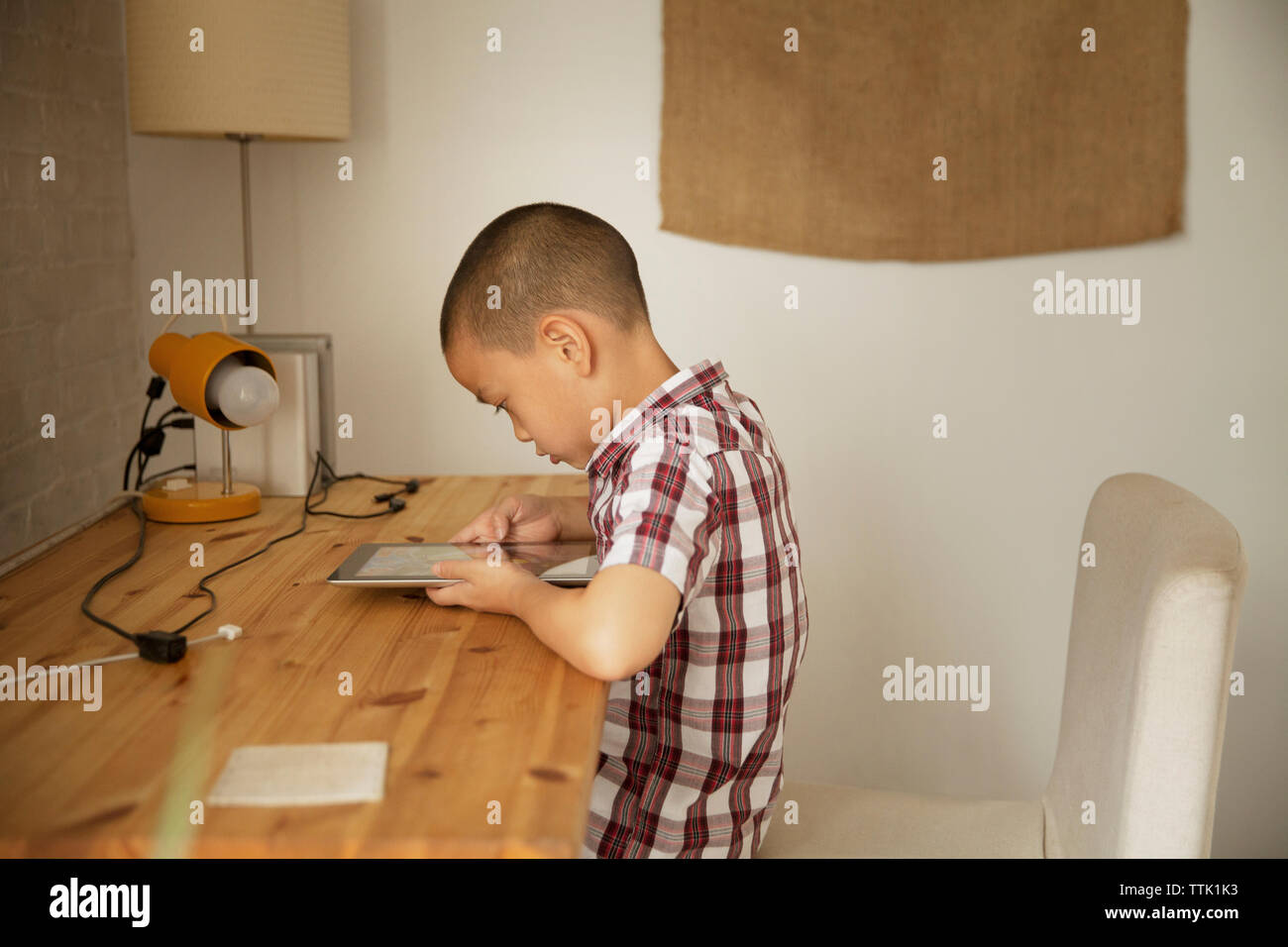 Boy profile tablet hi-res stock photography and images - Alamy