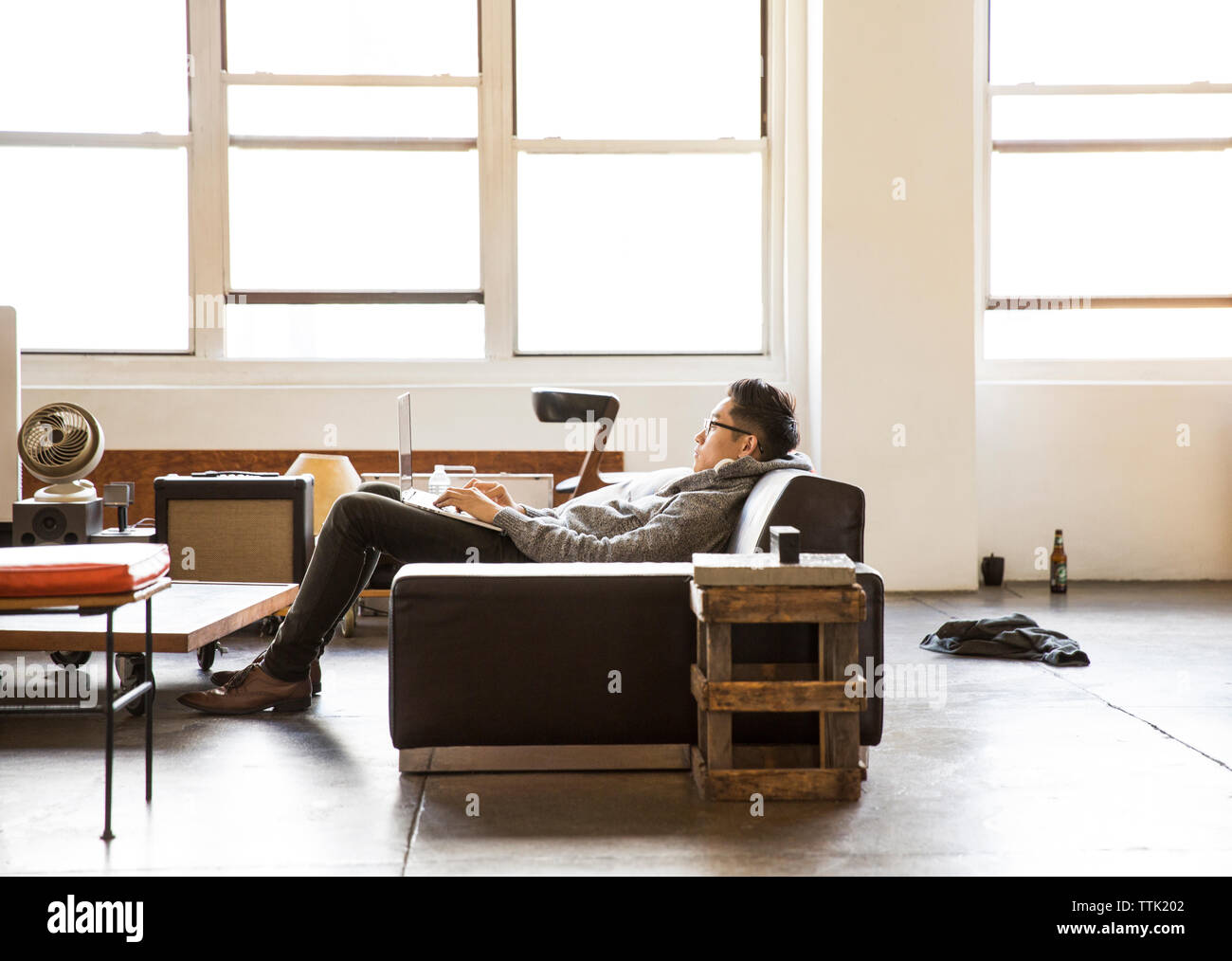 Man reclining sofa side profile hi-res stock photography and images - Alamy