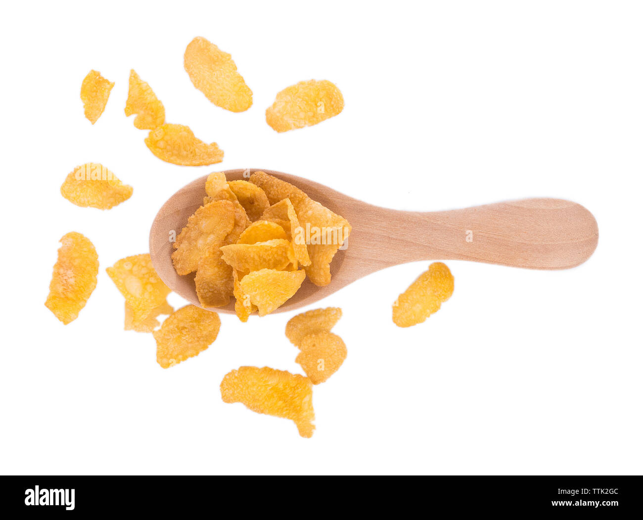 Corn flakes in wooden spoon isolated on white background Stock Photo ...
