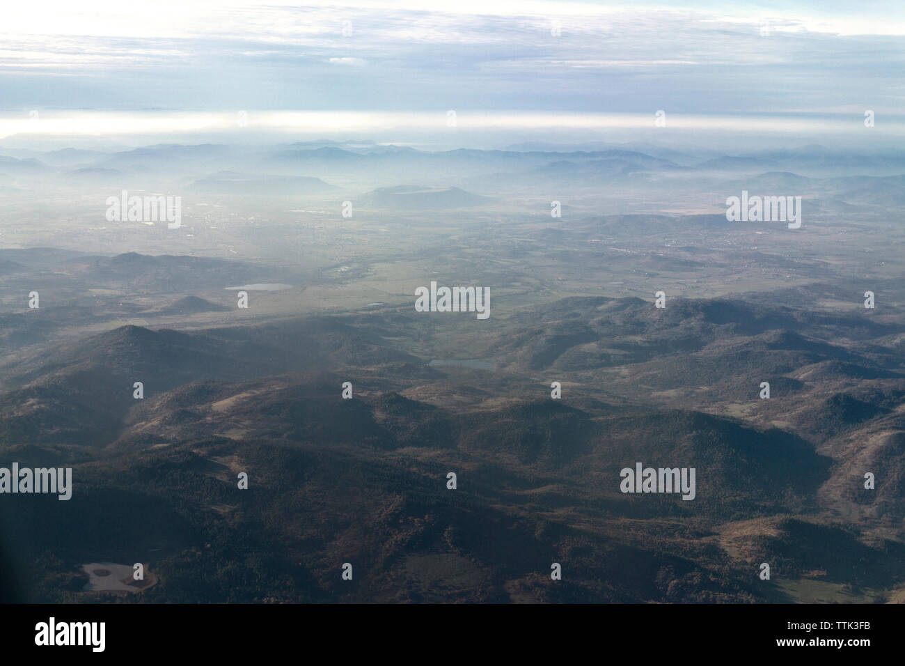 Aerial view of landscape against sky Stock Photo - Alamy