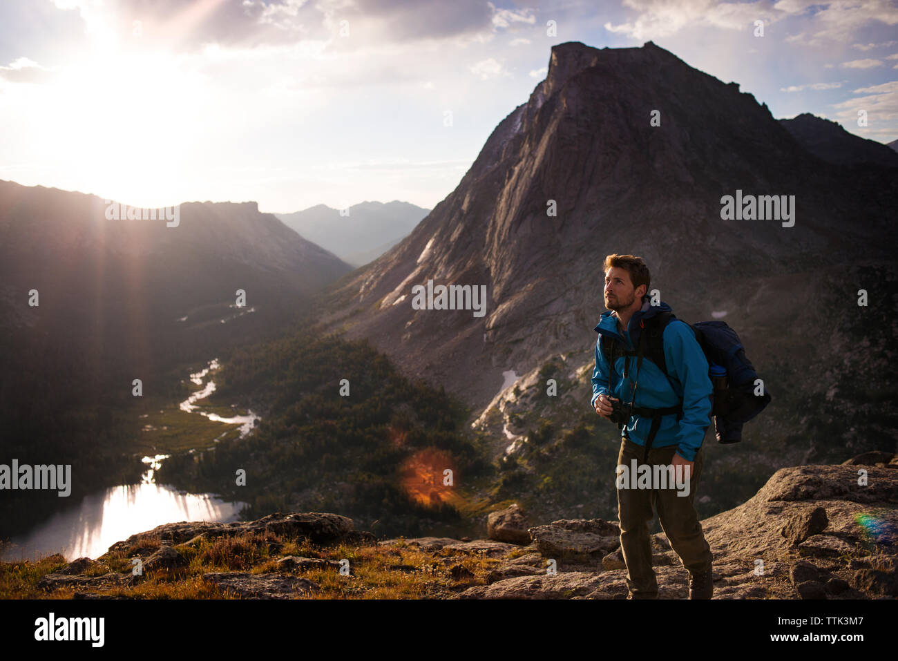 Adventure man hiking with backpack hi-res stock photography and images ...
