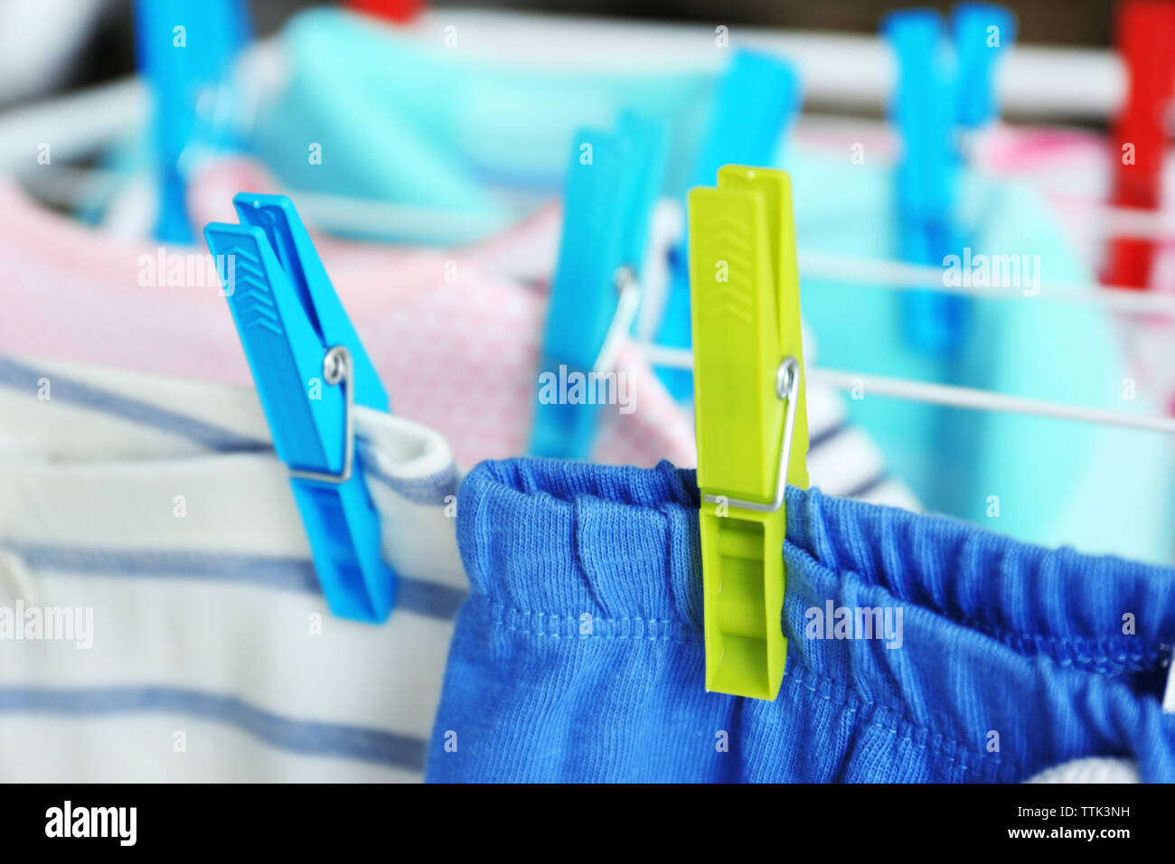 Drying baby clothes hi-res stock photography and images - Alamy