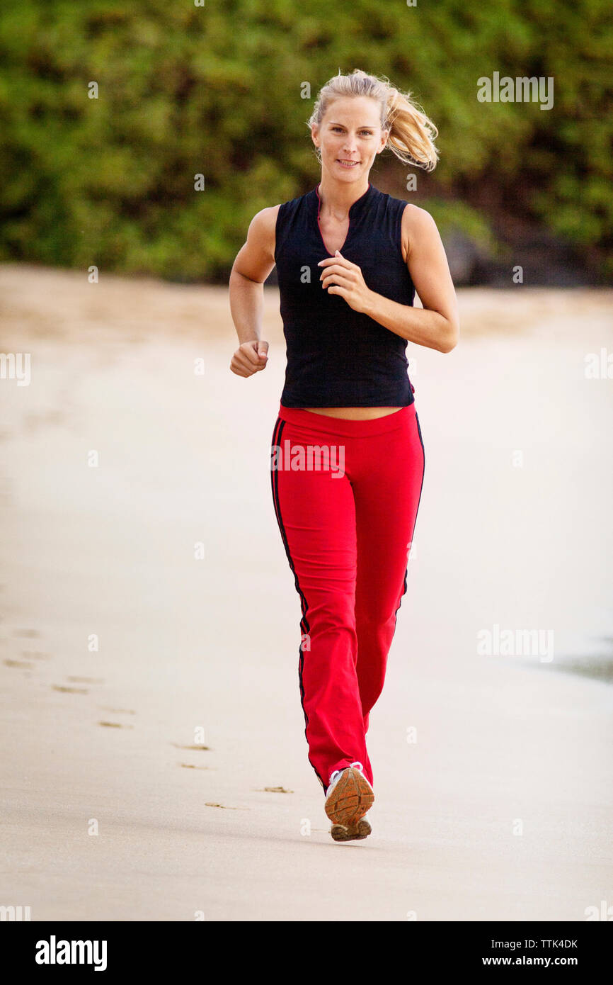 Hawaii beach vacation woman running hi-res stock photography and images ...