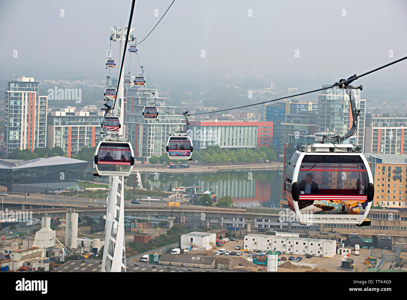 Overhead cable cars in city against sky Stock Photo - Alamy