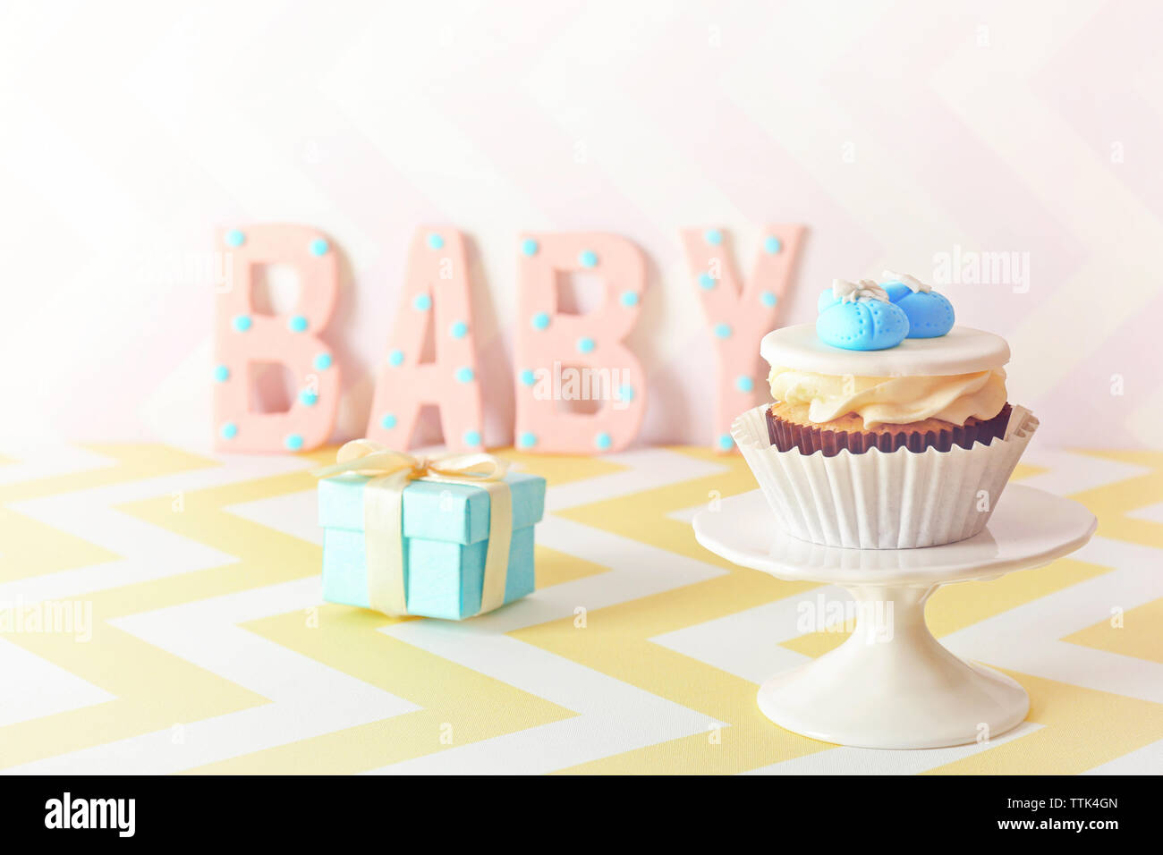 Word "Baby" with cupcake on bright background Stock Photo - Alamy