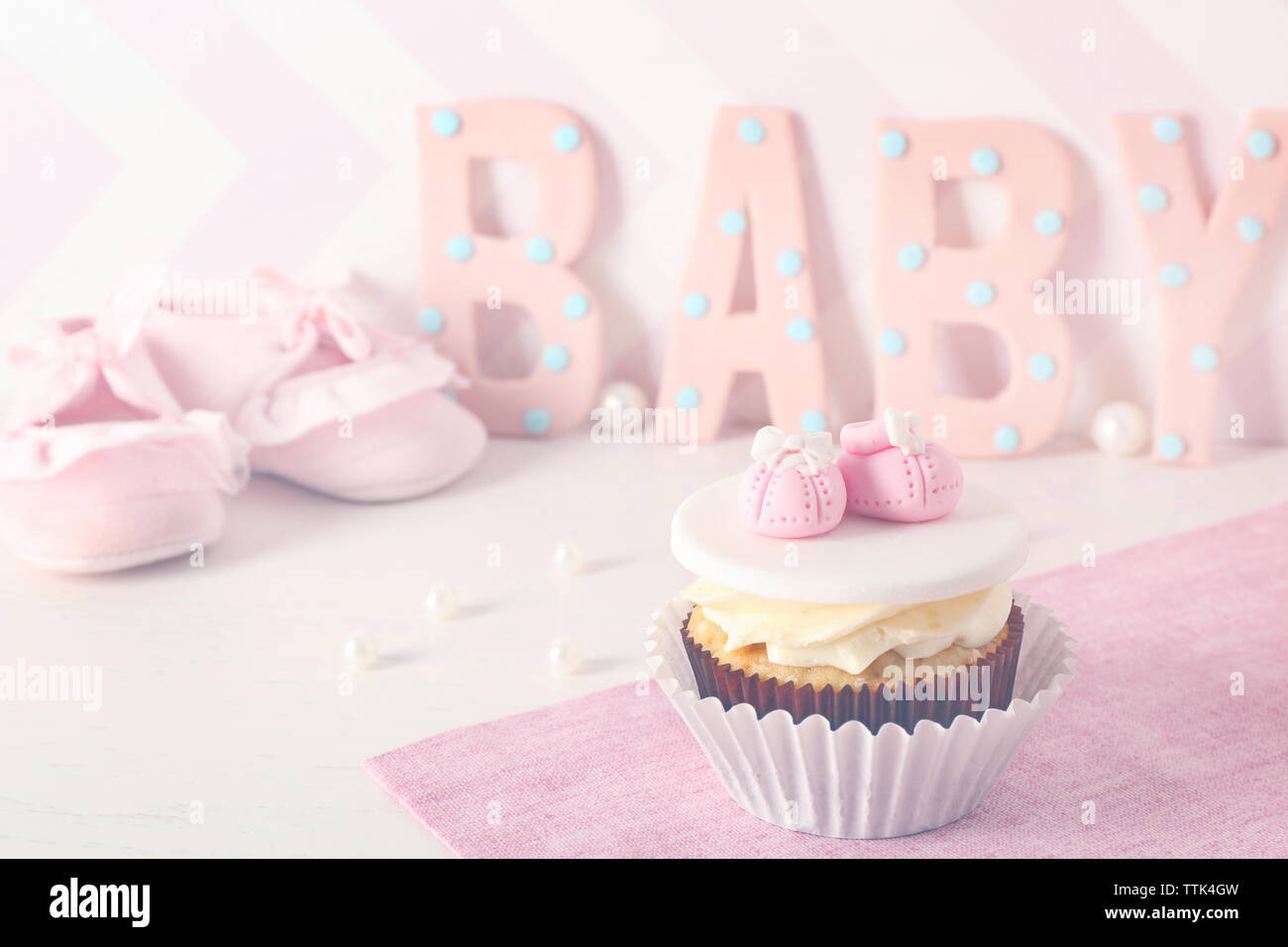 Word "Baby" with cupcake on light background Stock Photo - Alamy
