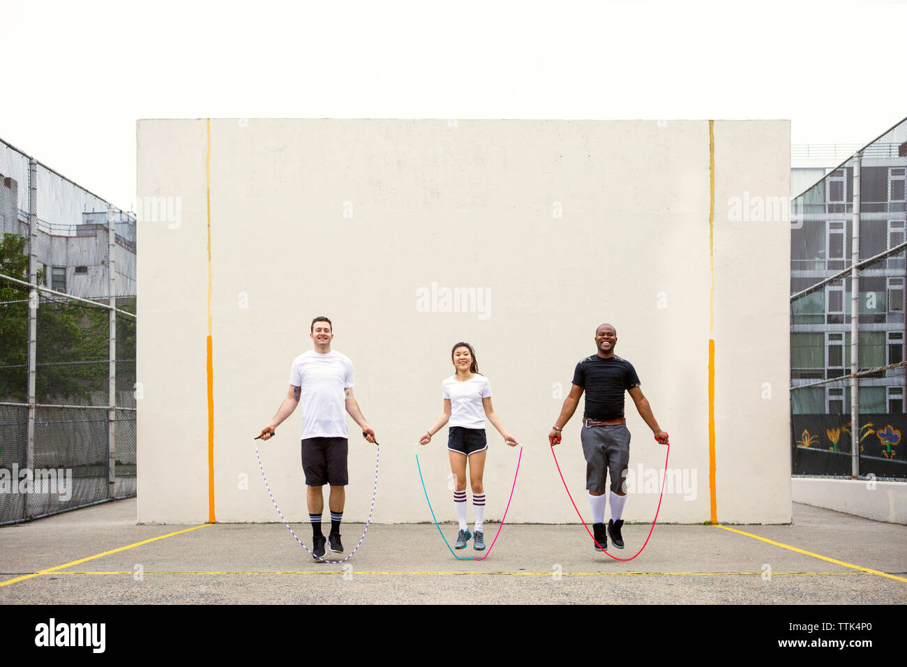 Three friends jump hi-res stock photography and images - Alamy