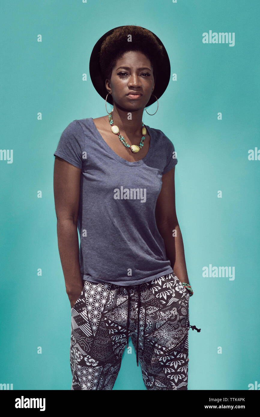 Female smiling pockets hi-res stock photography and images - Alamy