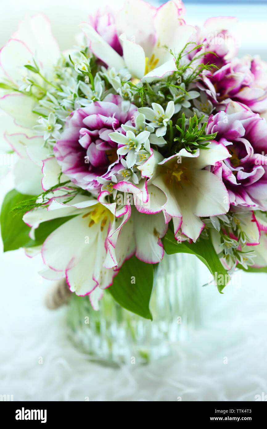 Bouquet of spring flowers on carpet Stock Photo - Alamy