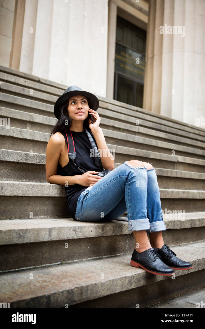 Smiling talking woman sitting on hi-res stock photography and images ...