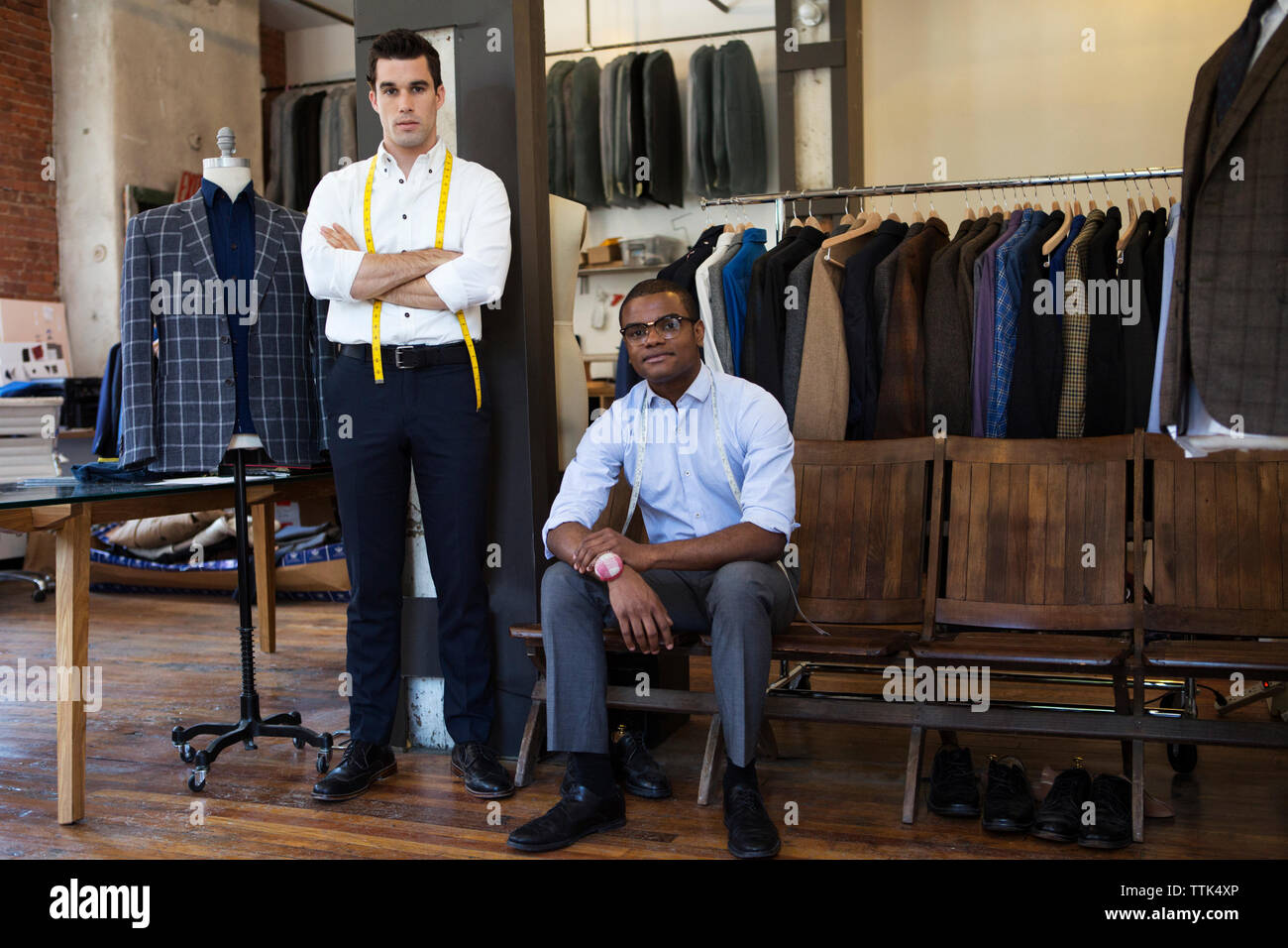 Confident design professionals at workshop Stock Photo - Alamy