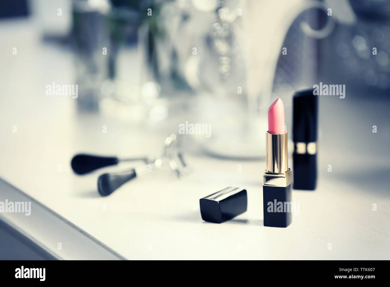 Lipstick on light dressing table, close up Stock Photo - Alamy