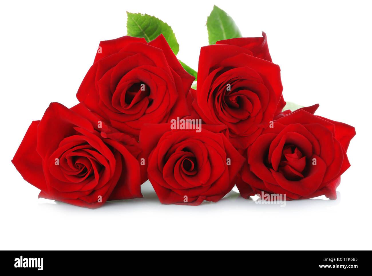 Five red roses on white background Stock Photo - Alamy