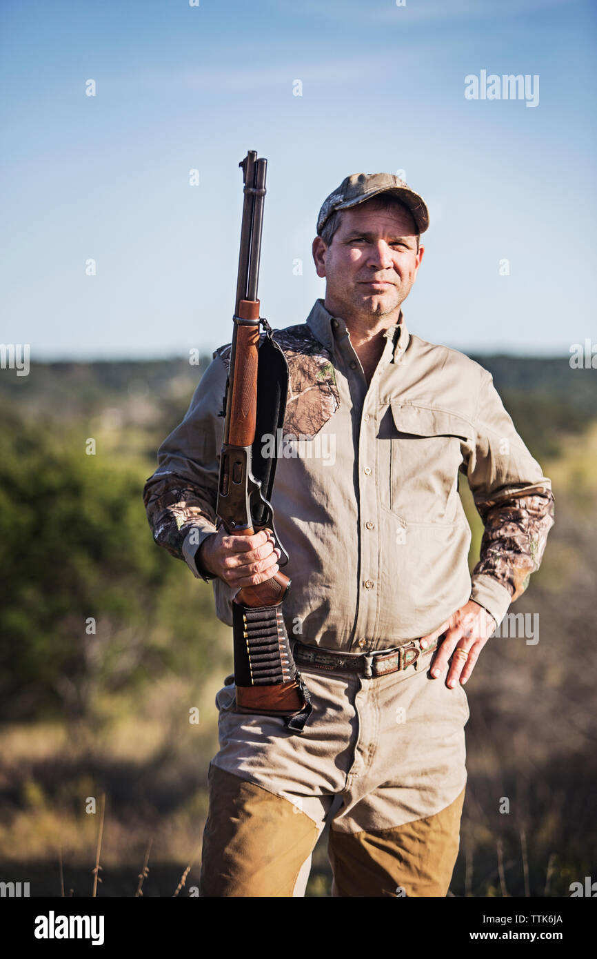 Holding rifle standing hi-res stock photography and images - Alamy