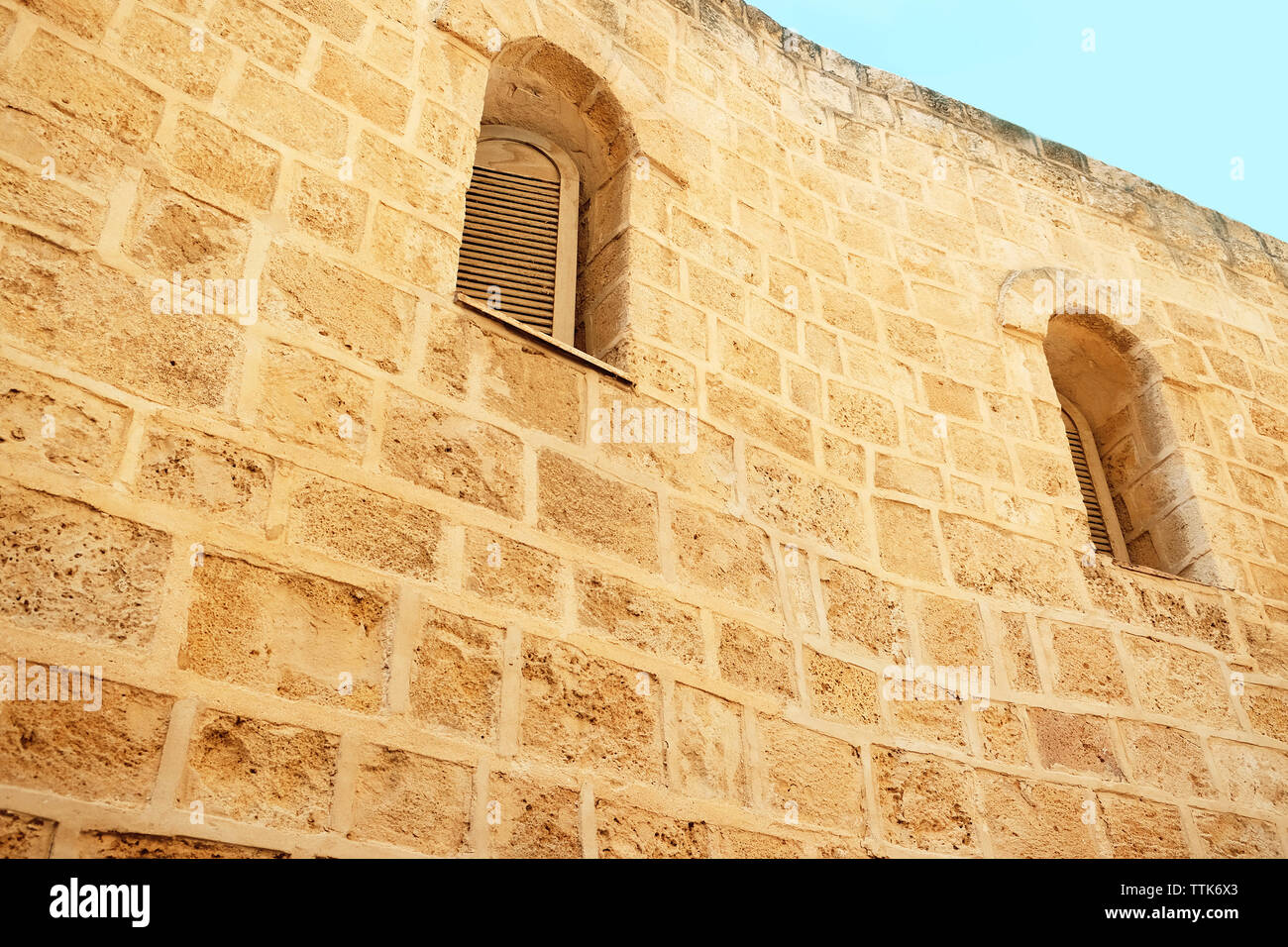 Windows on brick wall Stock Photo - Alamy