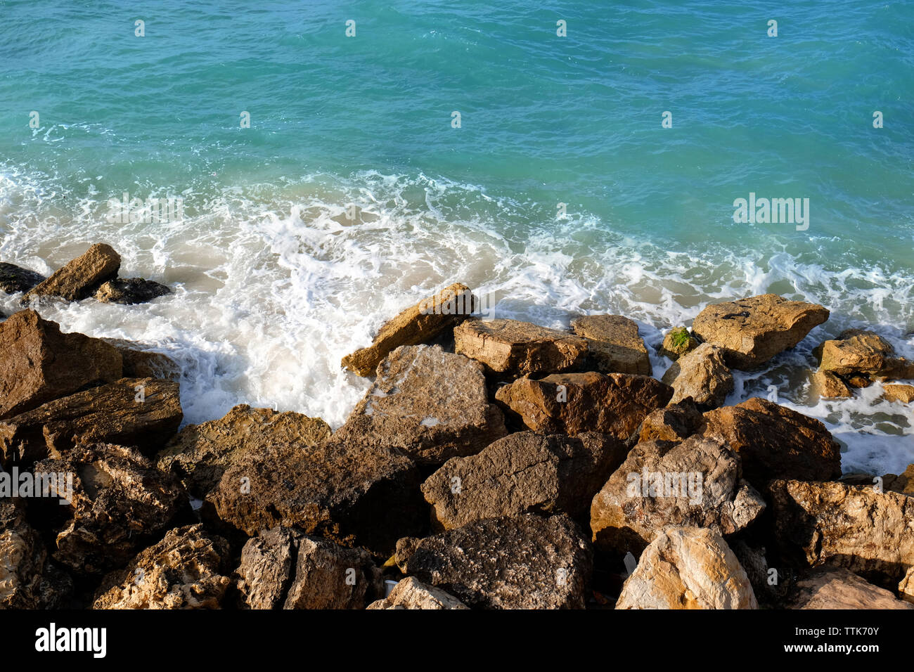 Sea beach with big rocks Stock Photo - Alamy