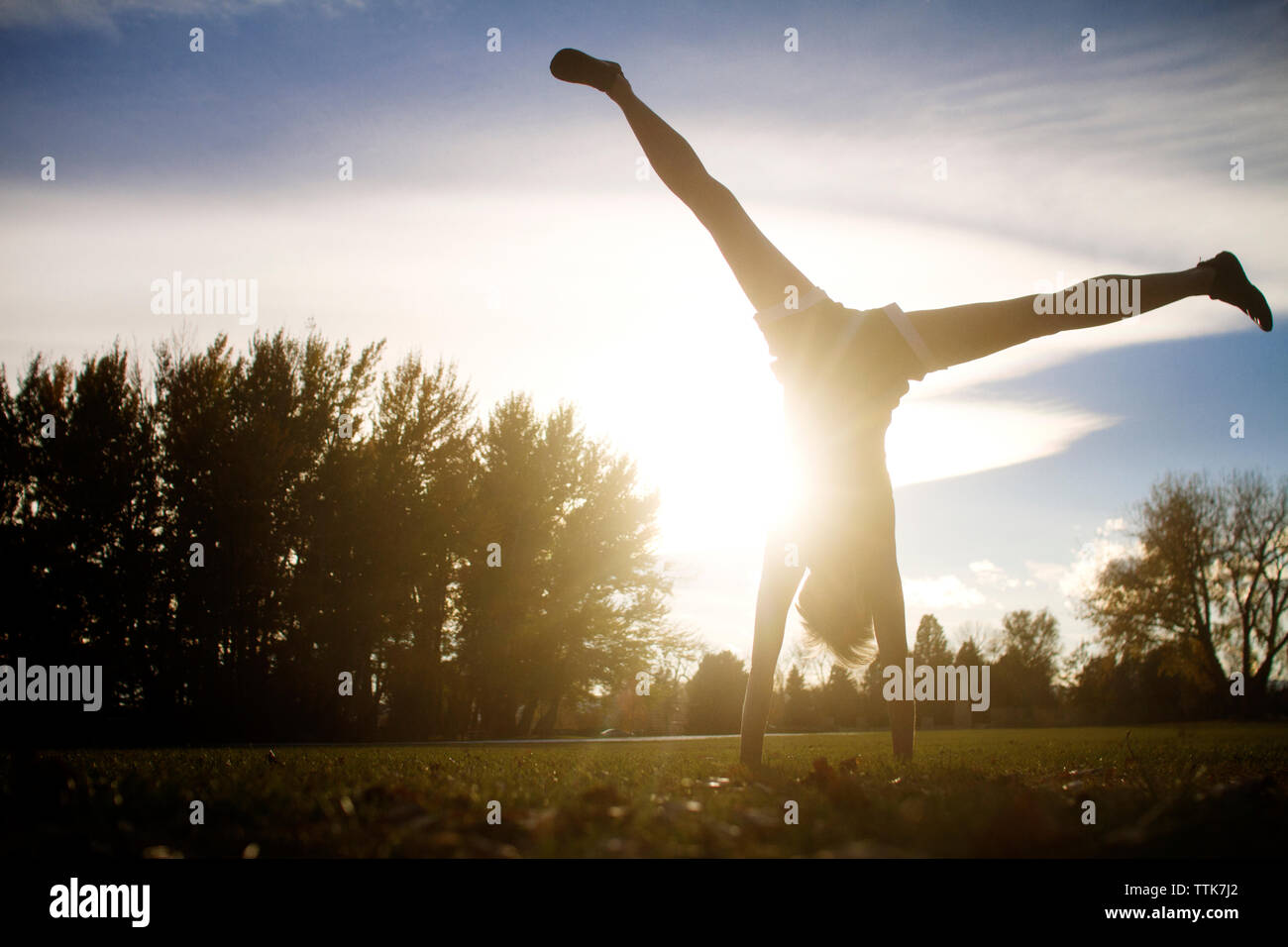 Female cartwheel hi-res stock photography and images - Alamy